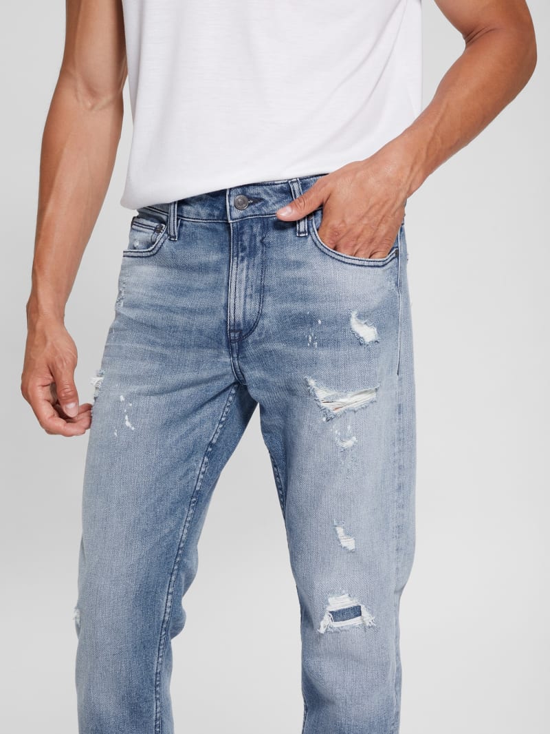 Eco Rip-and-Repair Tapered Jeans | GUESS Canada